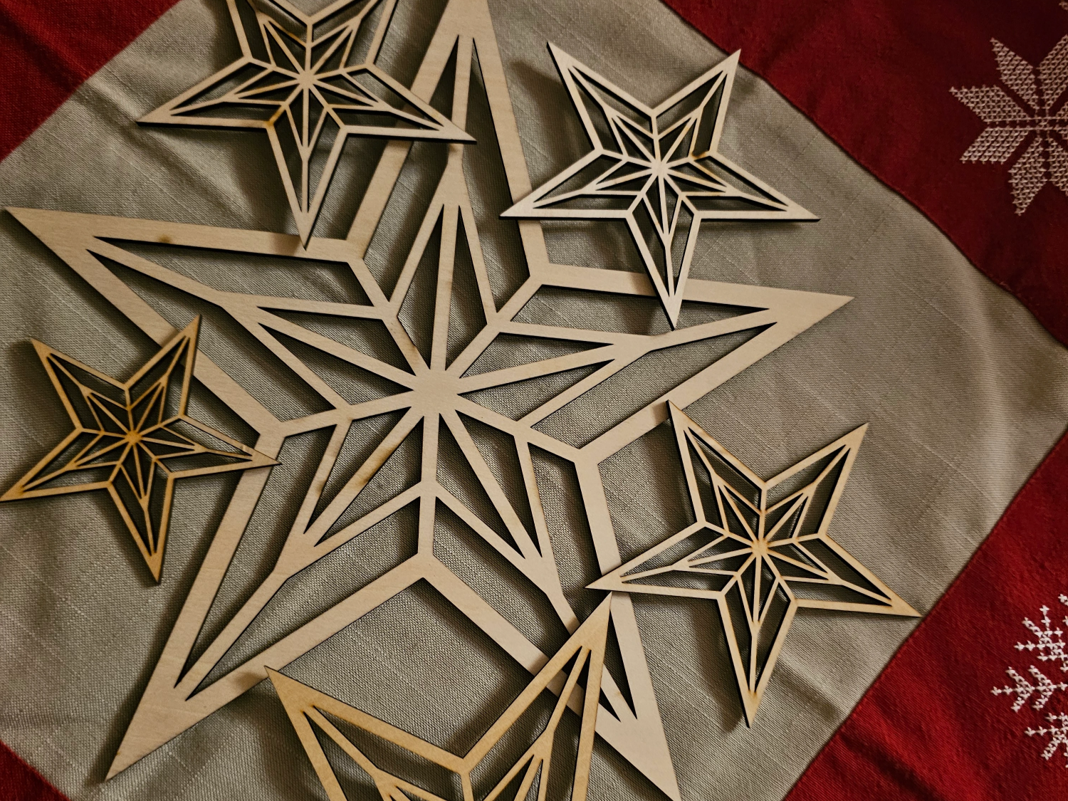 Laser Cut Wooden Star Ornaments on Festive Fabric ( Weihanachtsstern ...