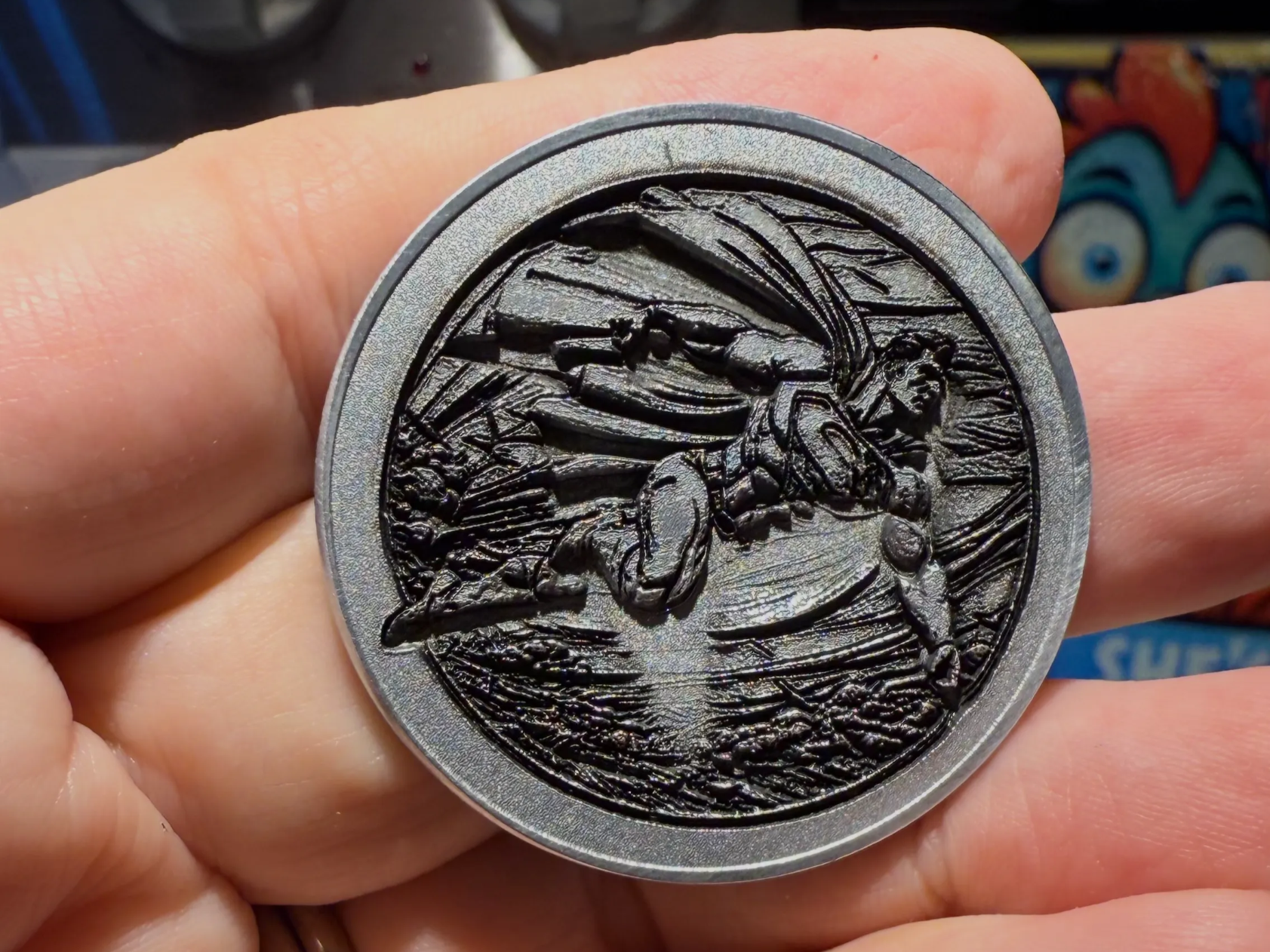 3D Printed Black Superhero Coin with Detailed Relief Design | Free ...