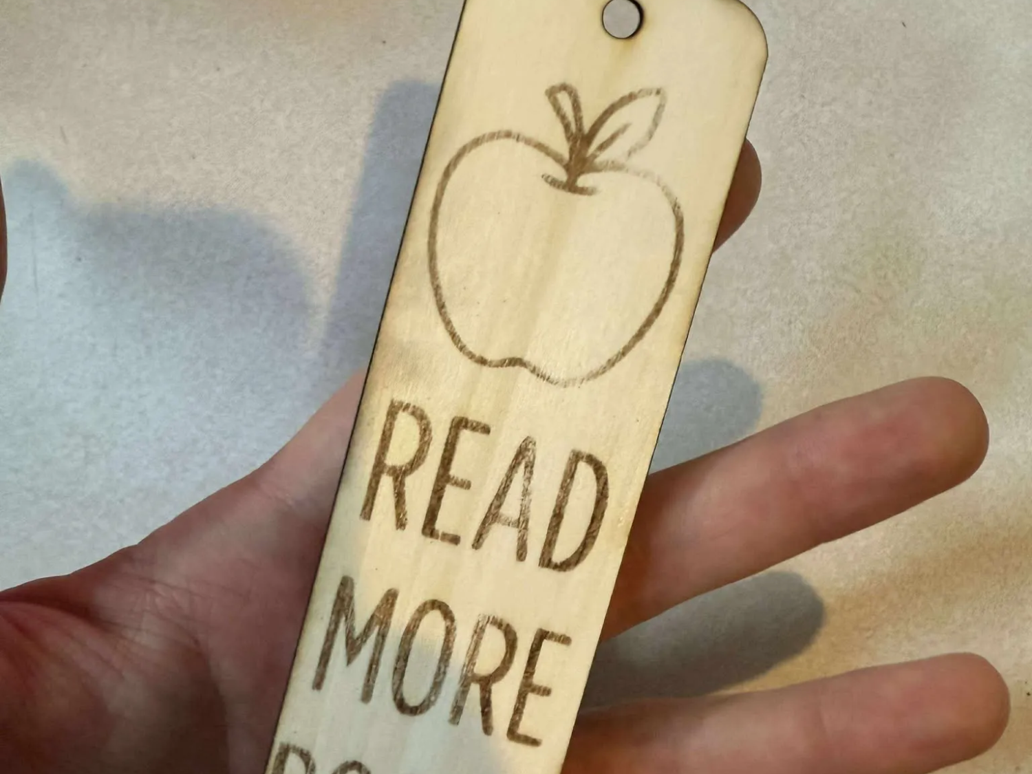 Laser cut and engrave | Laser Engraved Wooden Bookmark with Apple and ...